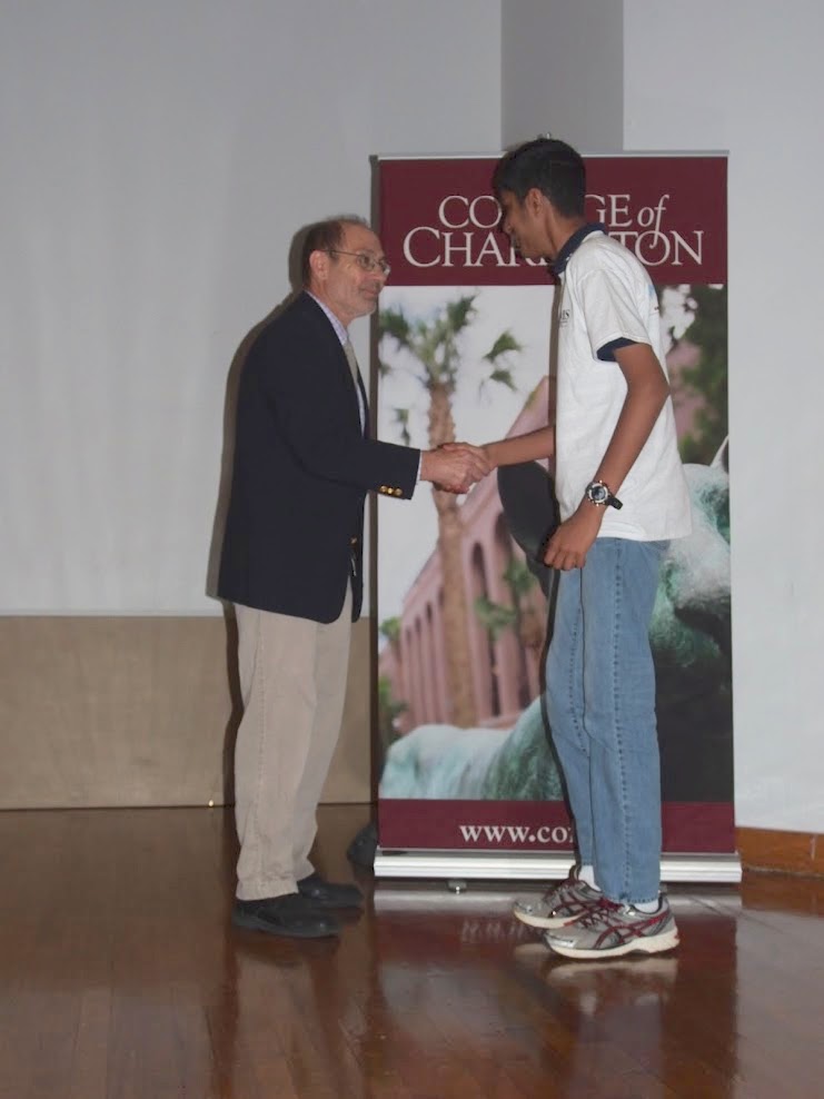 Andy Xu and David Stoner with their prizes from the American ...